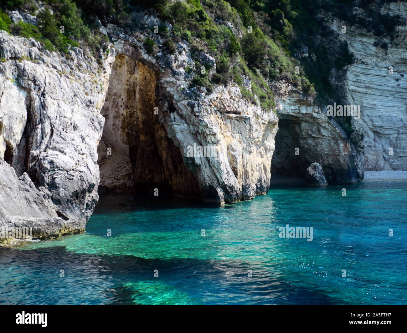 Blue caves on Corfu island in Greece Ionian sea Stock Photo - Alamy
