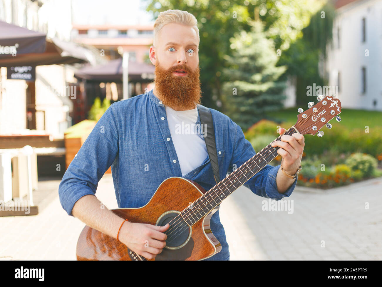 Bearded young male singer hi-res stock photography and images - Alamy