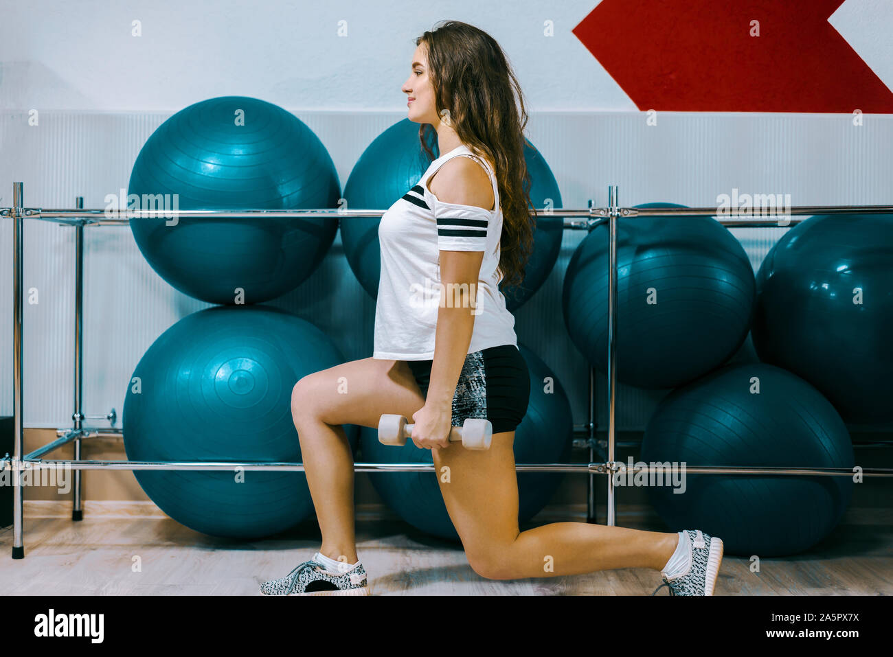 Woman crouching exercise hi-res stock photography and images - Alamy