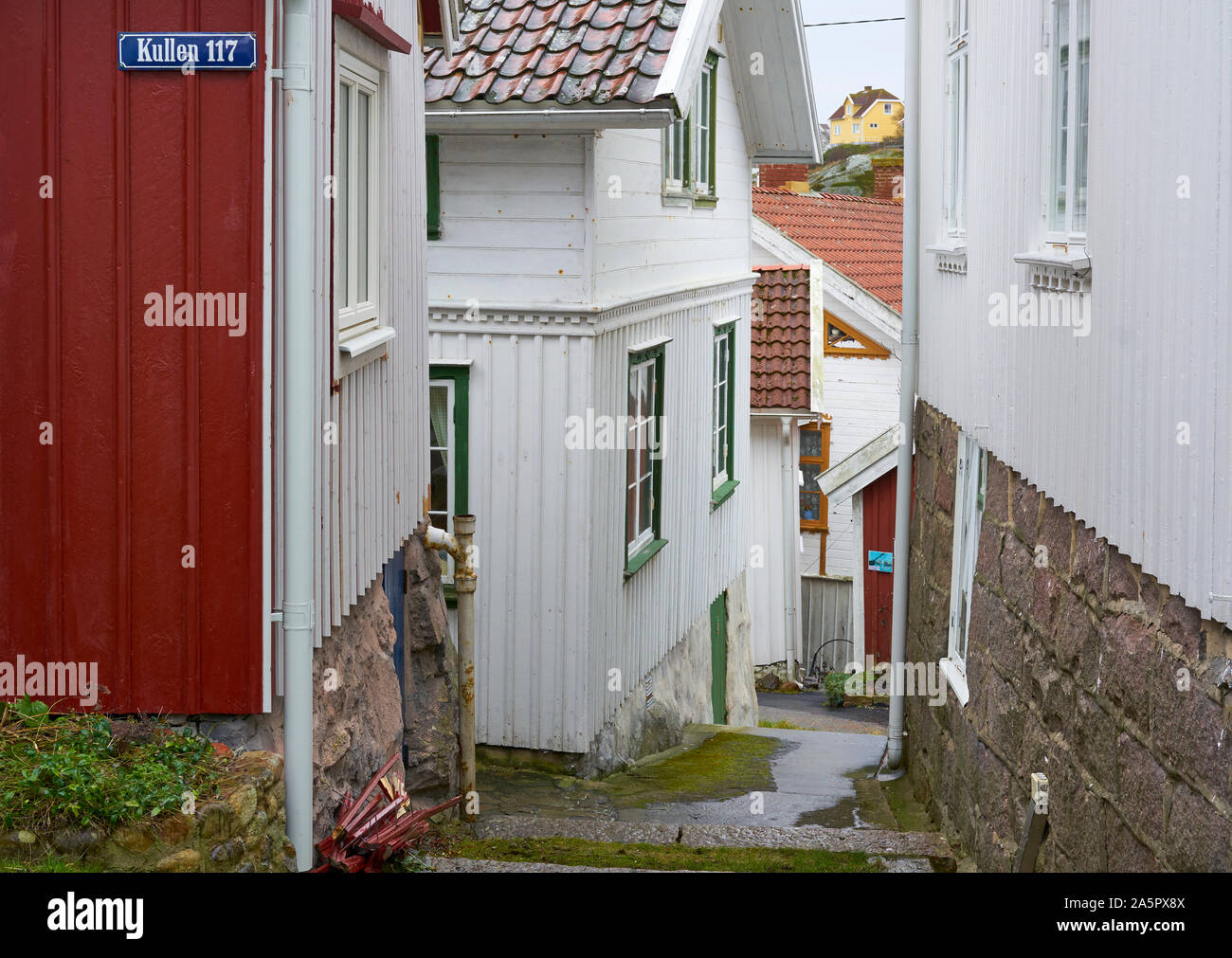 Small alley between houses Stock Photo - Alamy