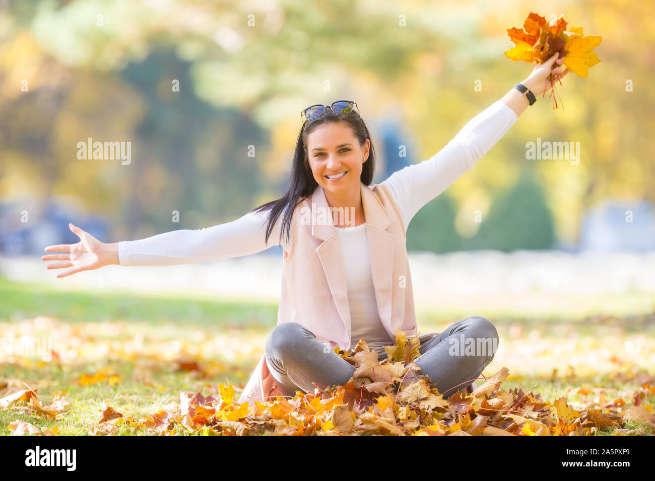 Elegant lady in fall park hi-res stock photography and images - Alamy