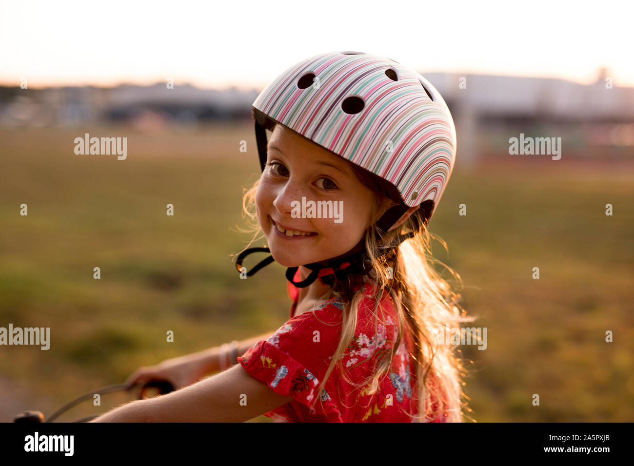 Portrait of cycling girl Stock Photo - Alamy