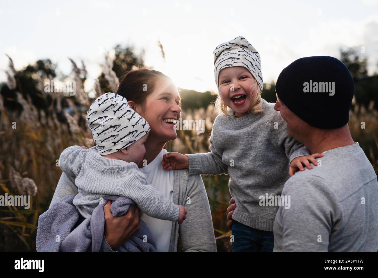 Happy family together Stock Photo - Alamy