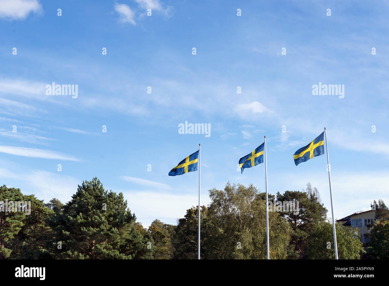 Three Swedish flags Stock Photo - Alamy