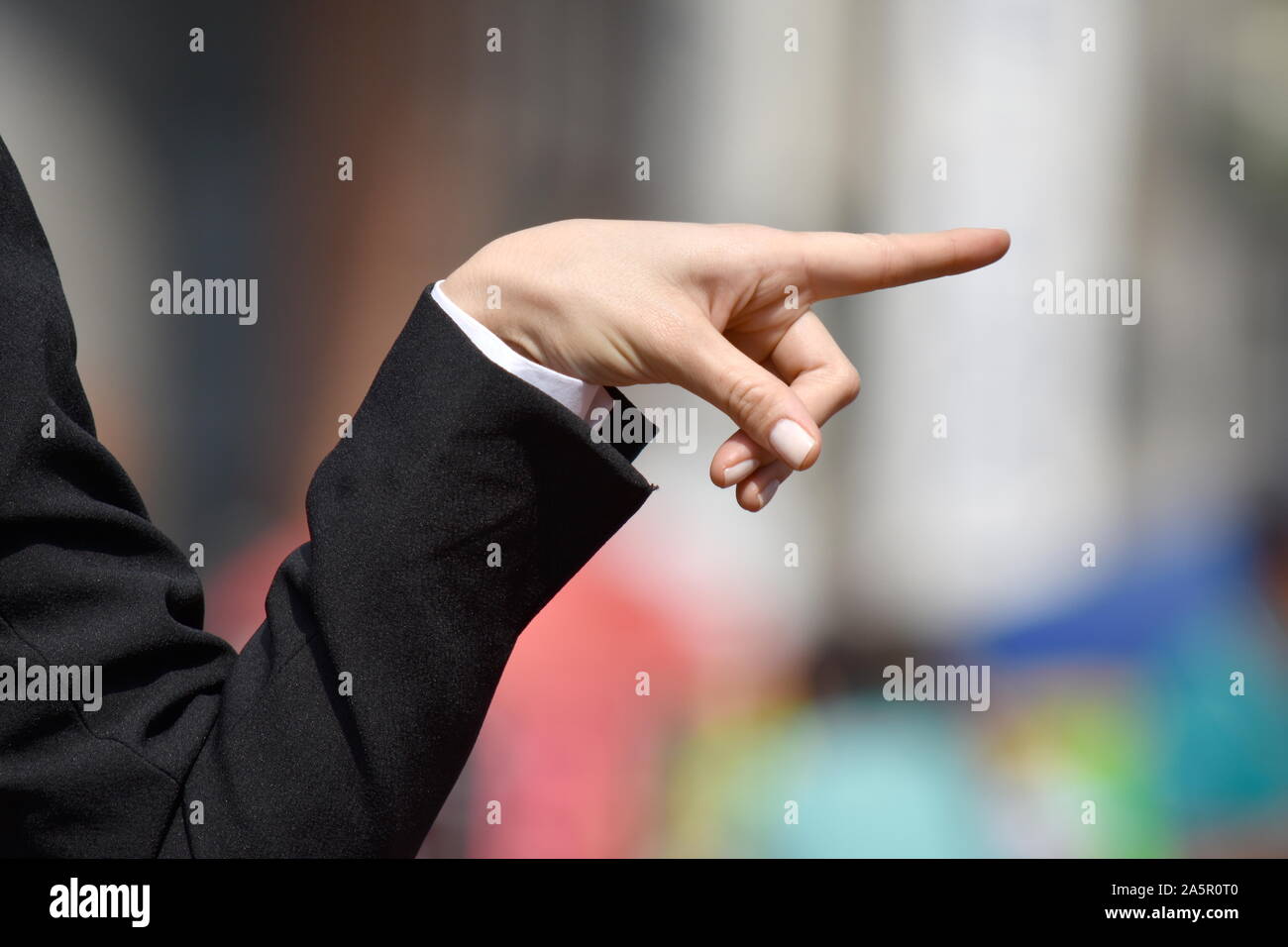 Mature business lady pointing hi-res stock photography and images - Alamy