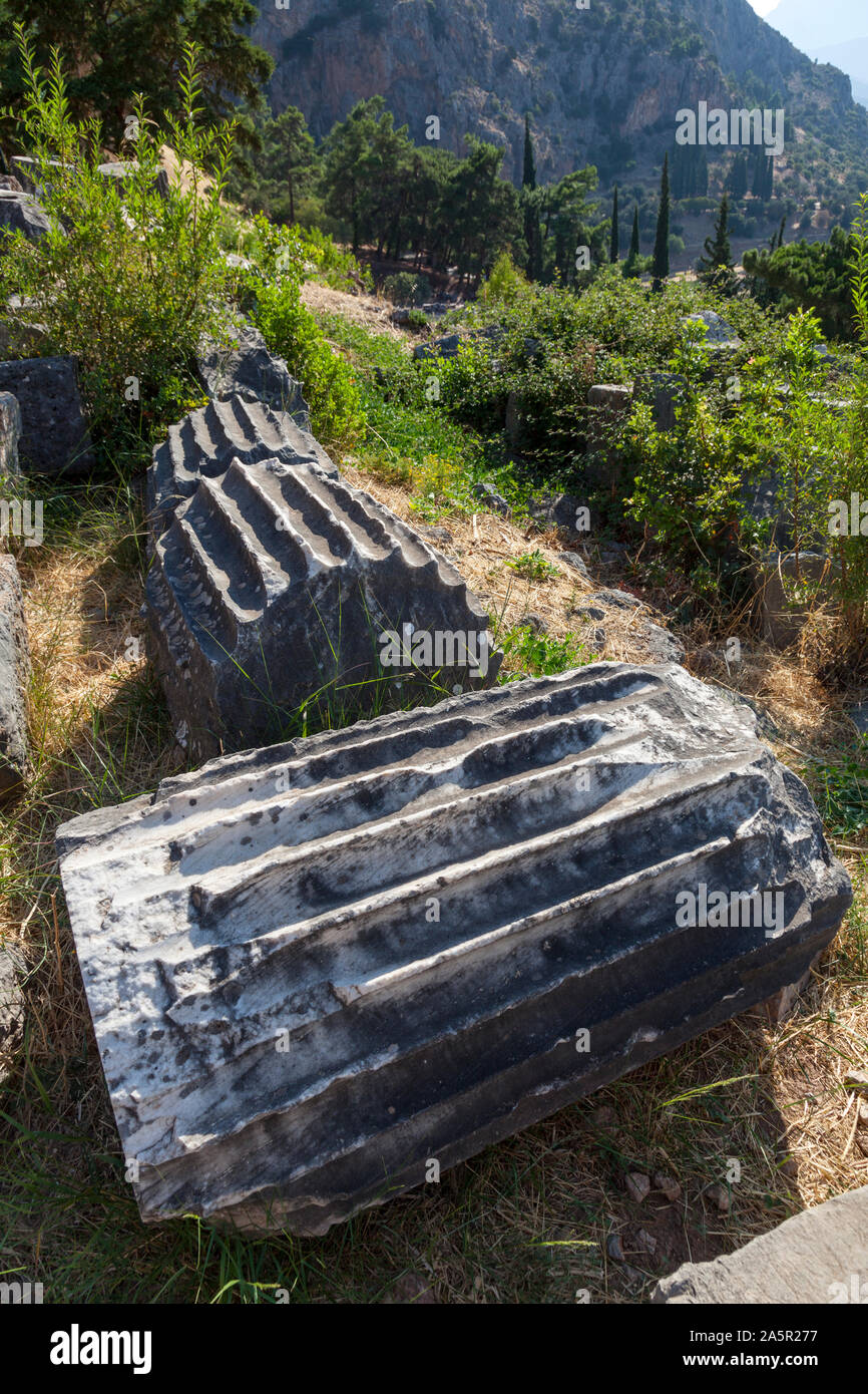 Fallen column at Delphi, Greece Stock Photo - Alamy