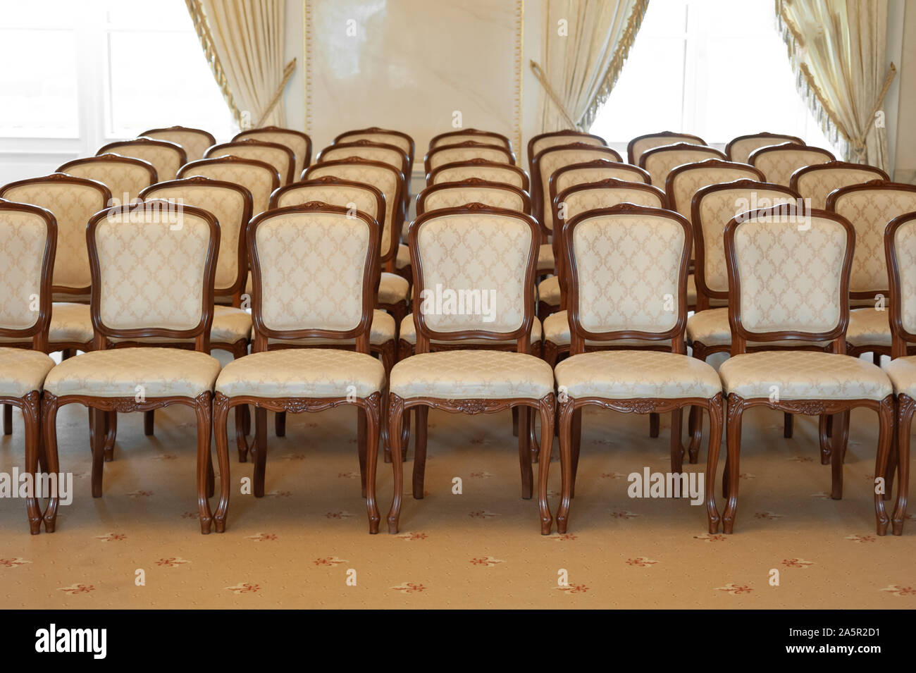 Front view of antique chairs indoors Stock Photo - Alamy