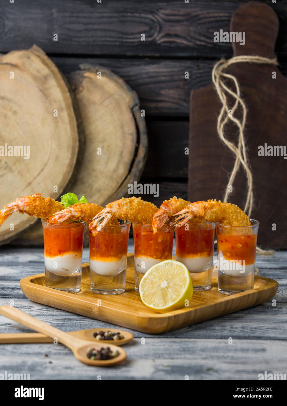 fried shrimp cocktail shots filled with mayonnaise and sweet chili ...