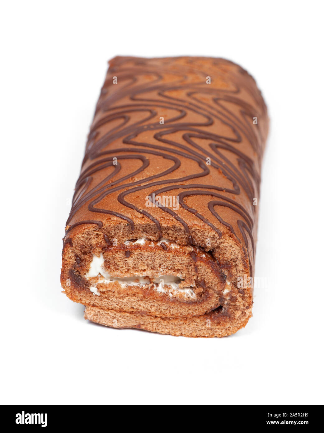 Baked roll with cream filling isolated on white Stock Photo - Alamy
