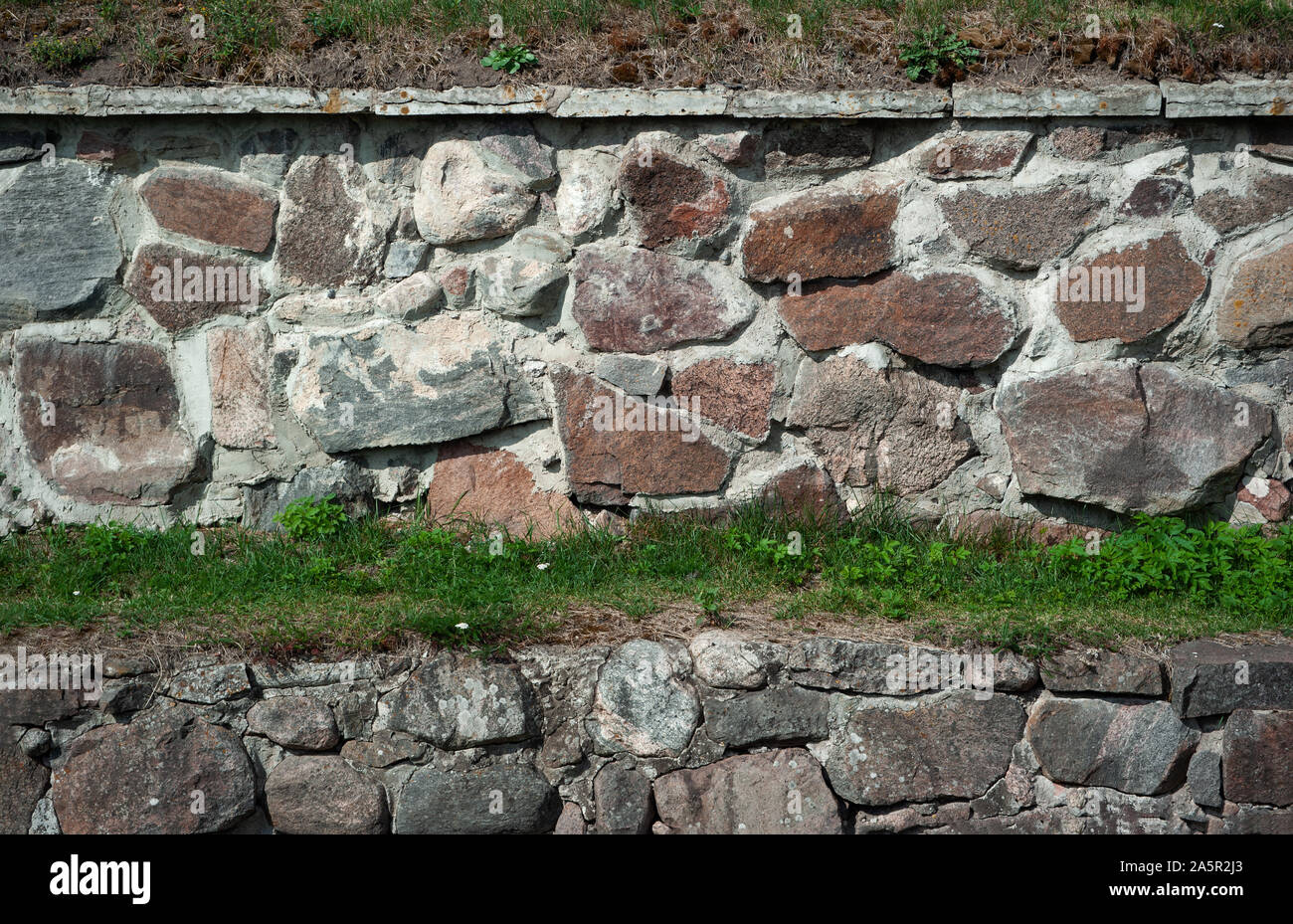 Masonry stone wall rock construction pattern texture Stock Photo - Alamy