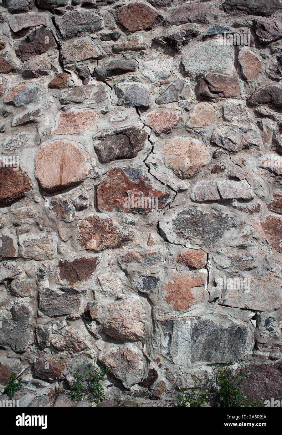Masonry stone wall rock construction pattern texture Stock Photo - Alamy