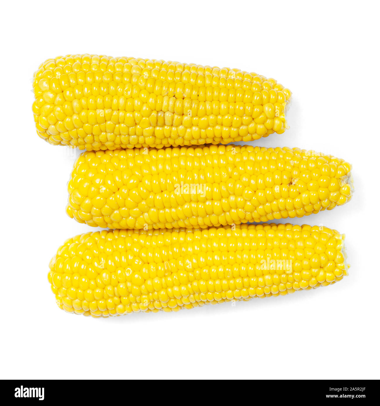 Yelllow ear of corn isolated on white background Stock Photo - Alamy