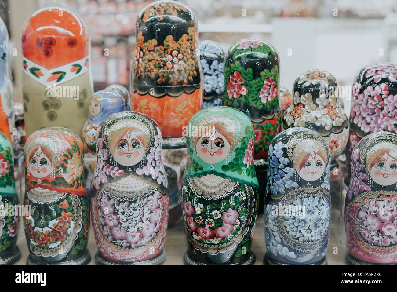 Russian national toy matryoshka in different colors Stock Photo - Alamy