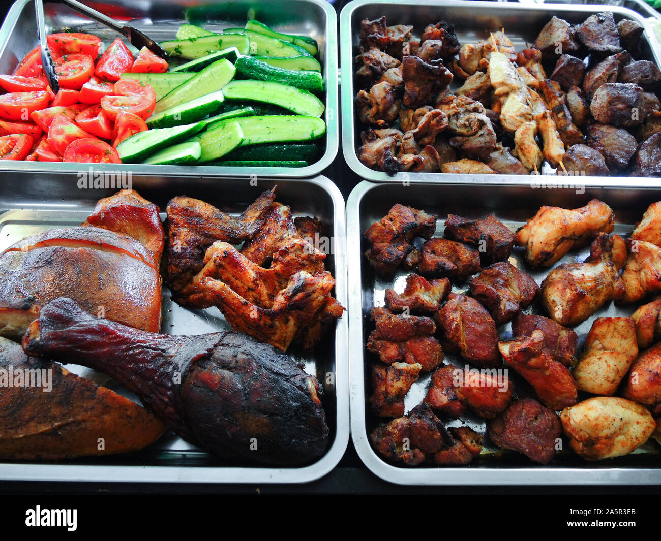 Assortment of grilled meat, chicken, lamb, beef and pork and fresh ...