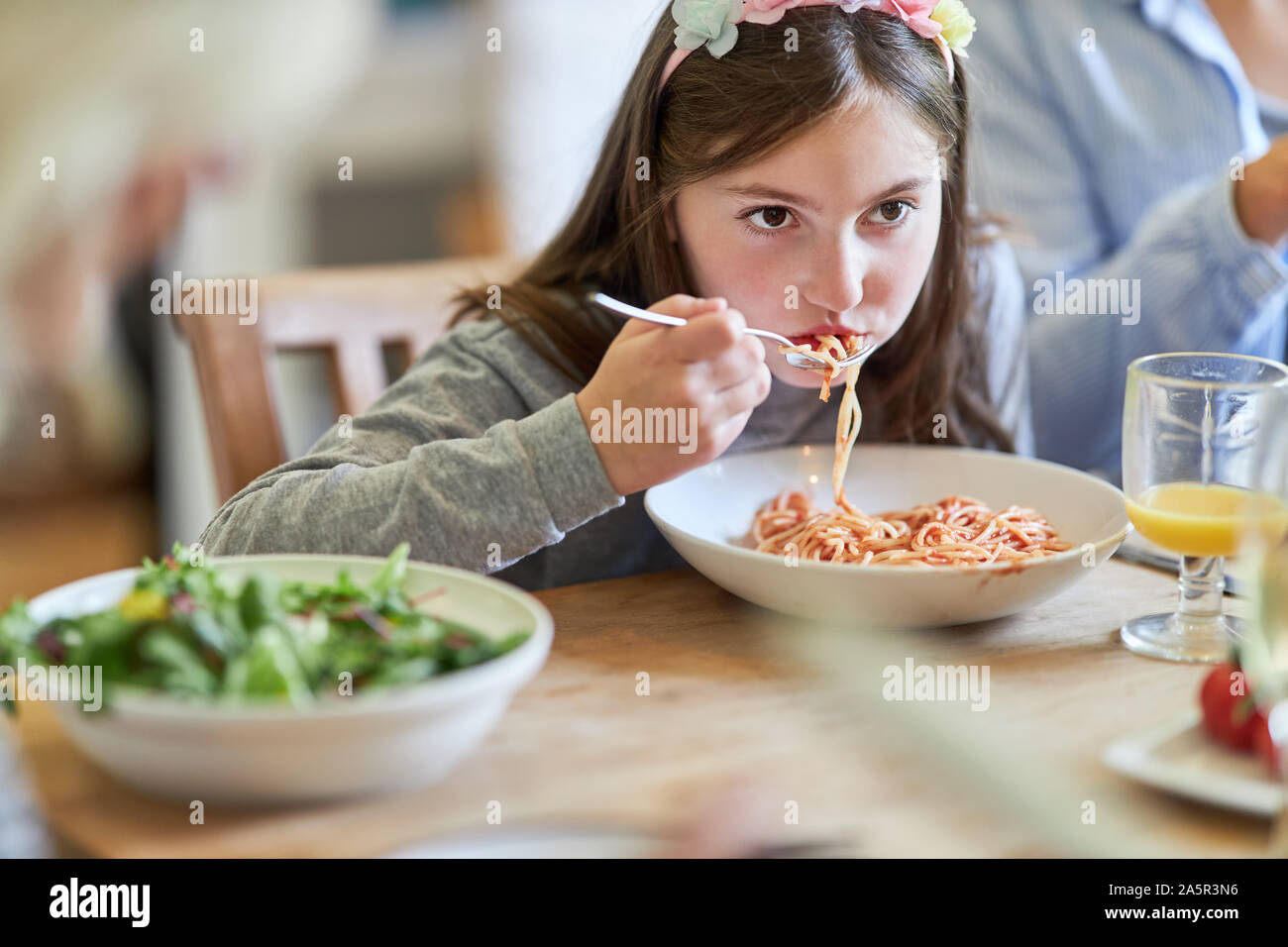 Kid eating spaghetti hi-res stock photography and images - Alamy