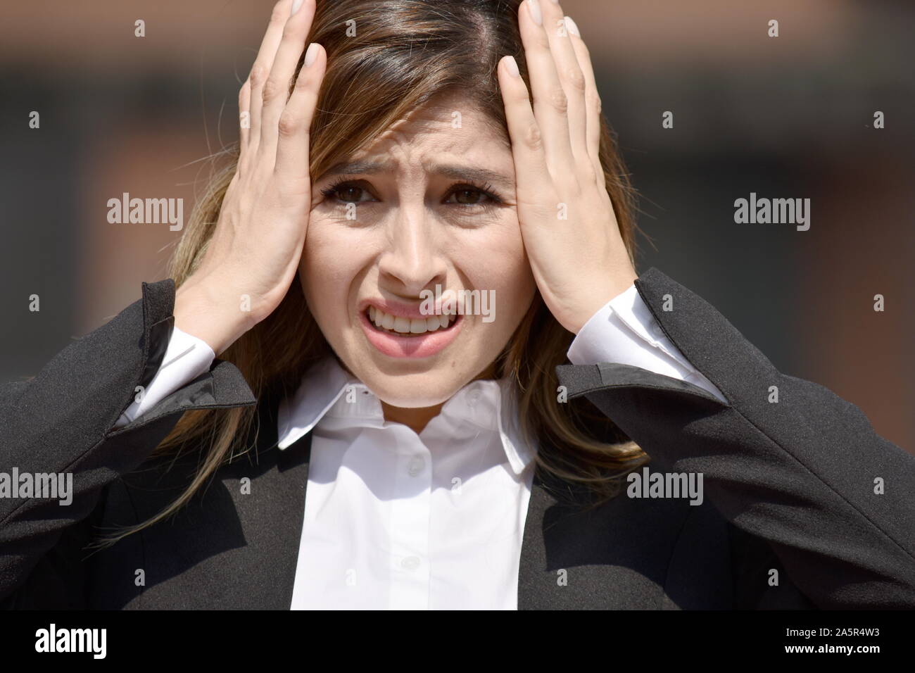 Business Woman Under Stress Wearing Suit Stock Photo - Alamy