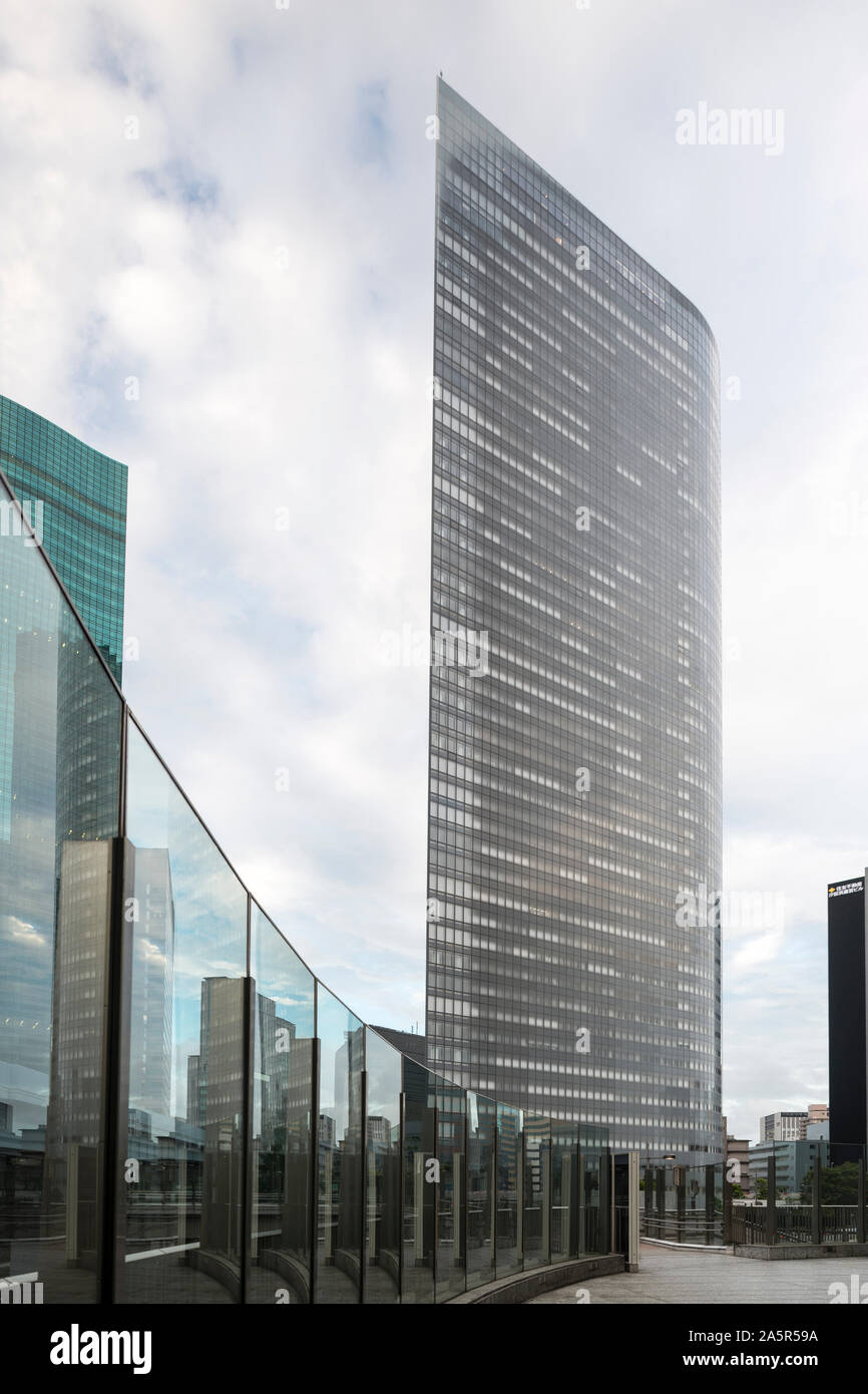 Dentsu Building with clouds, Shiodome, Tokyo, Japan Stock Photo - Alamy