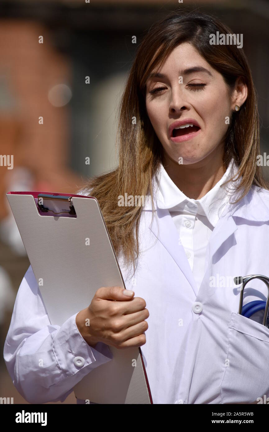 Cute Female Doctor Winking Stock Photo - Alamy