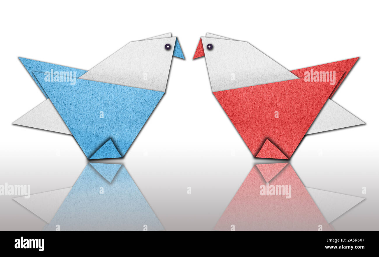 bird made from paper cut on white background Stock Photo - Alamy