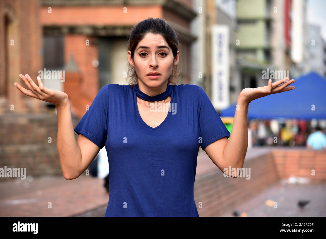 An Indecisive Attractive Diverse Person Stock Photo - Alamy