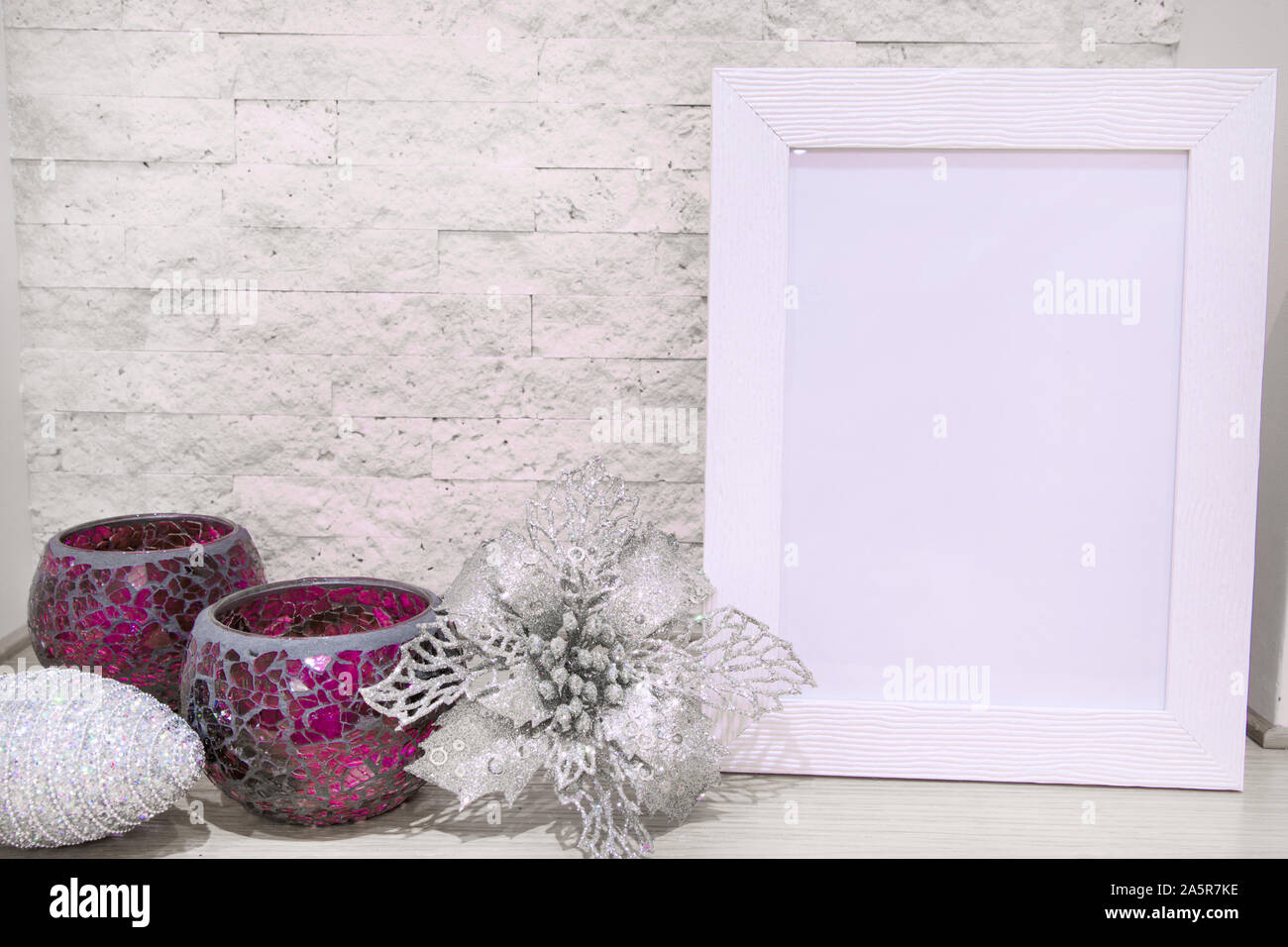 Christmas mock up frame with violet candlestick and Christmas silver ...