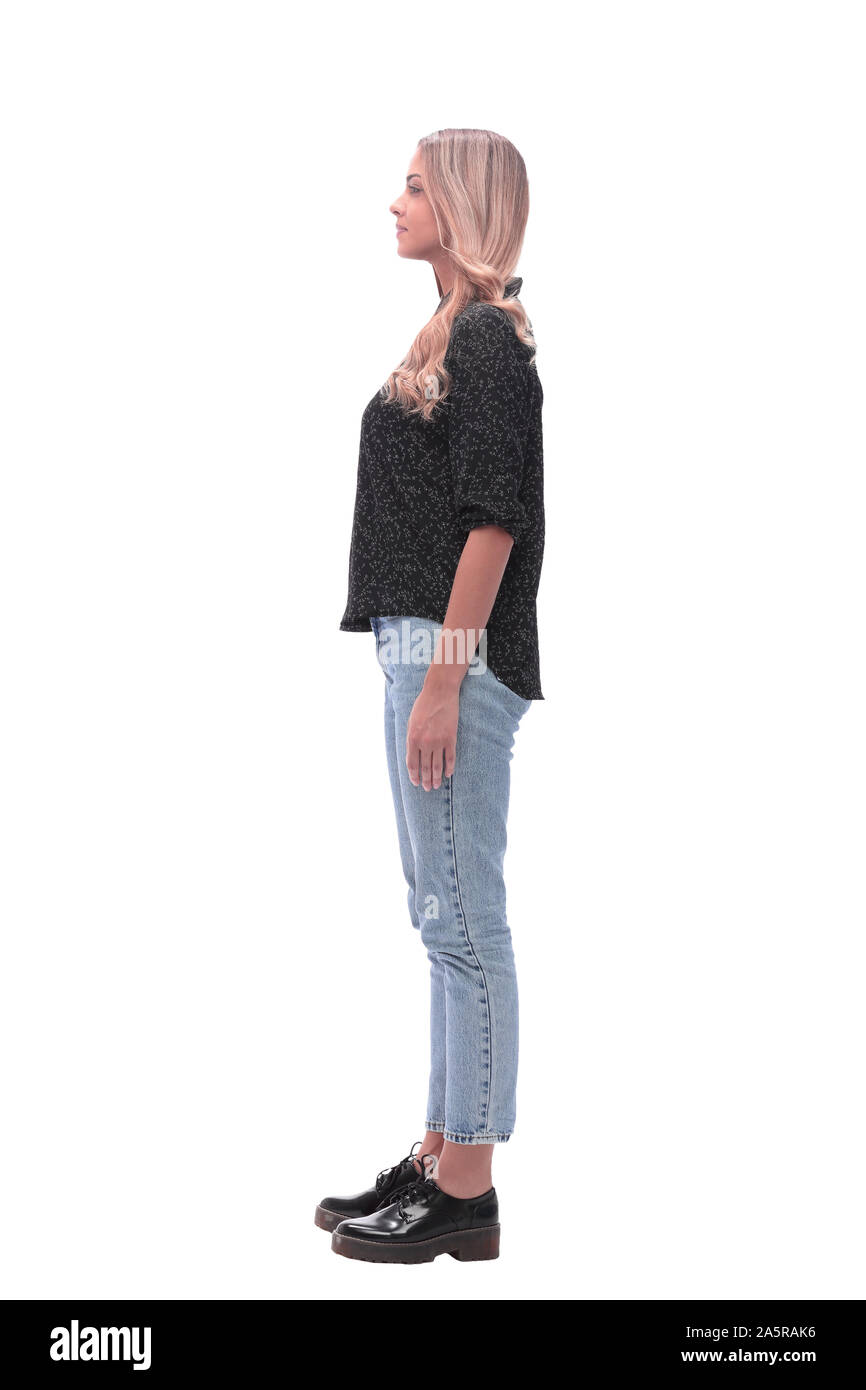 side view. modern young woman in jeans and black blouse Stock Photo - Alamy