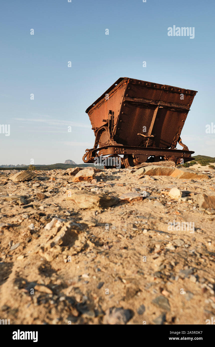 Rusting abandoned industrial mining tipping wagons of the Montevecchio ...