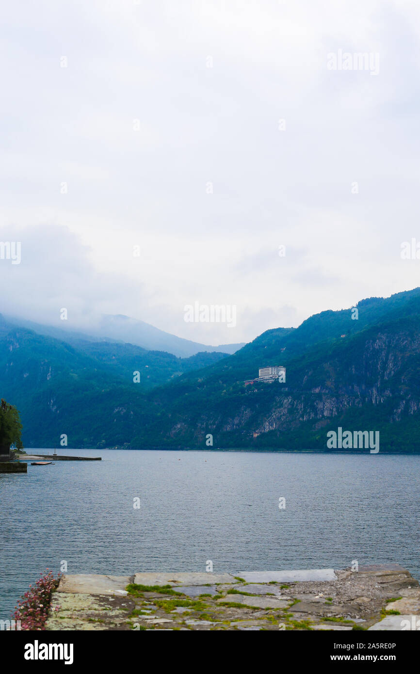 Amazing lake Como with Alps mountains in background Stock Photo - Alamy