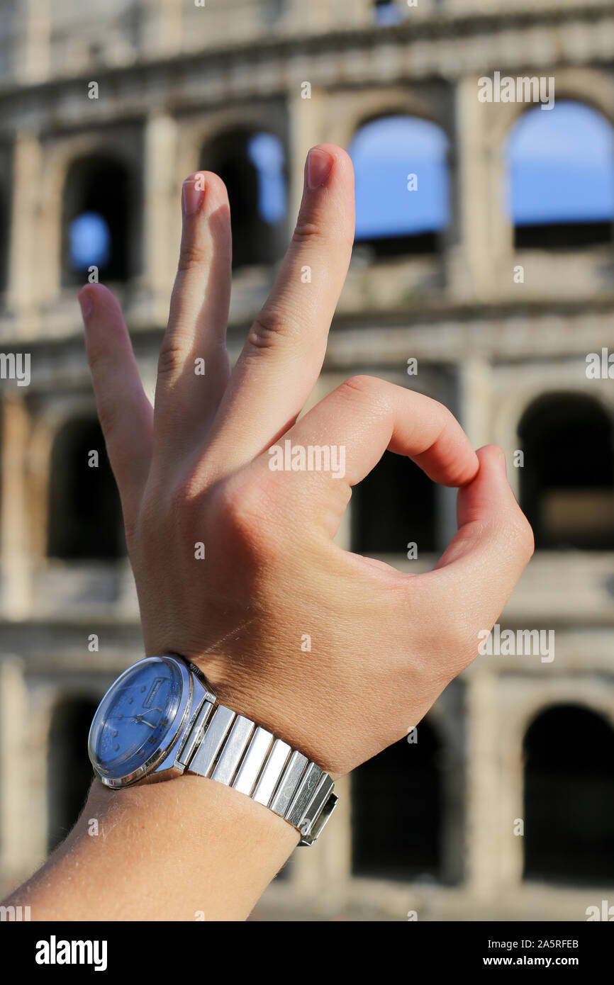 Gesture ok in colosseum background in Rome, Italy Stock Photo - Alamy