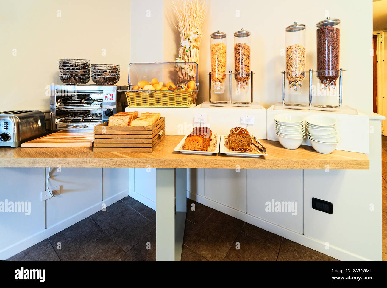 Hotel breakfast restaurant interior with bread and cereals on ...