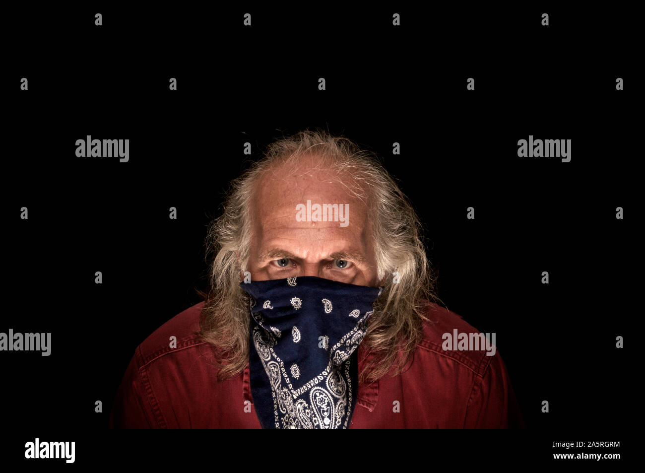 Portrait of a gruff looking old west bandit Stock Photo - Alamy