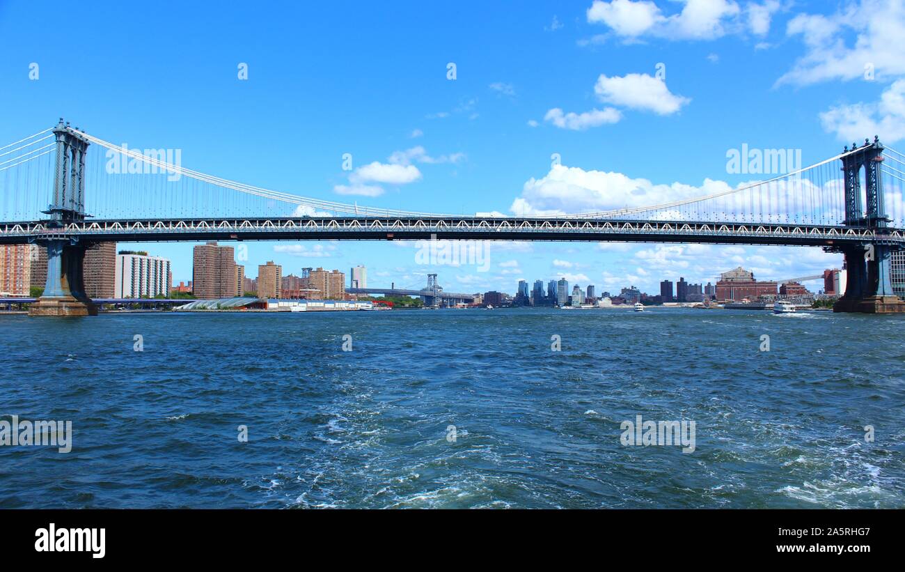 The Manhattan Bridge in New York City, which crosses the East River and ...