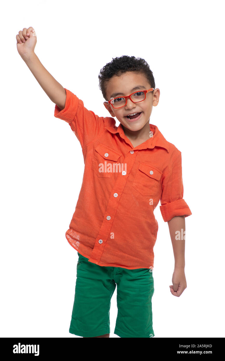Happy Young Winner Boy Celebrating His Success, Hands Up Over White ...