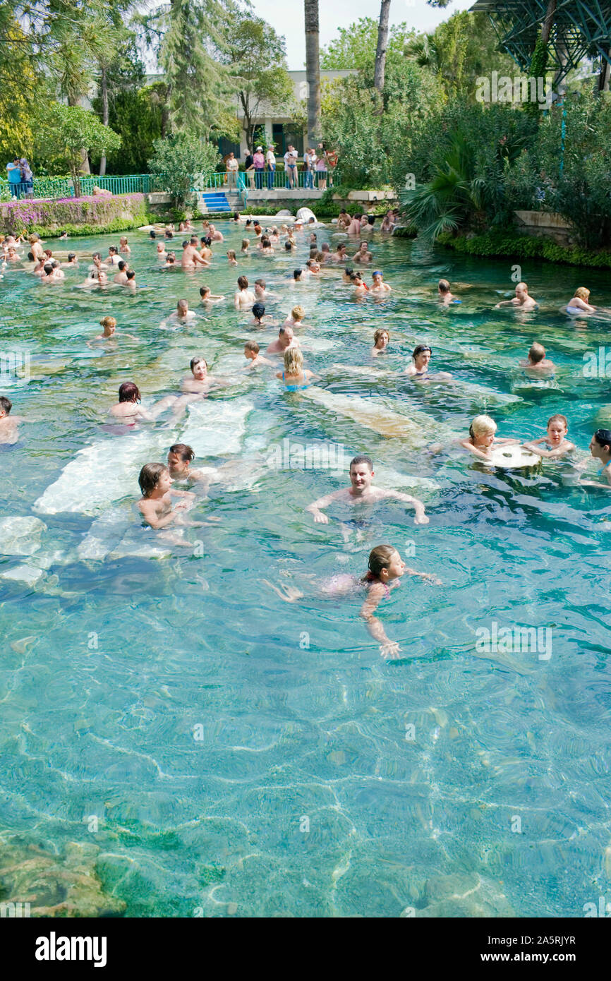 People bathing in hot spring mineral water pool, Hierapolis, Pamukkale ...