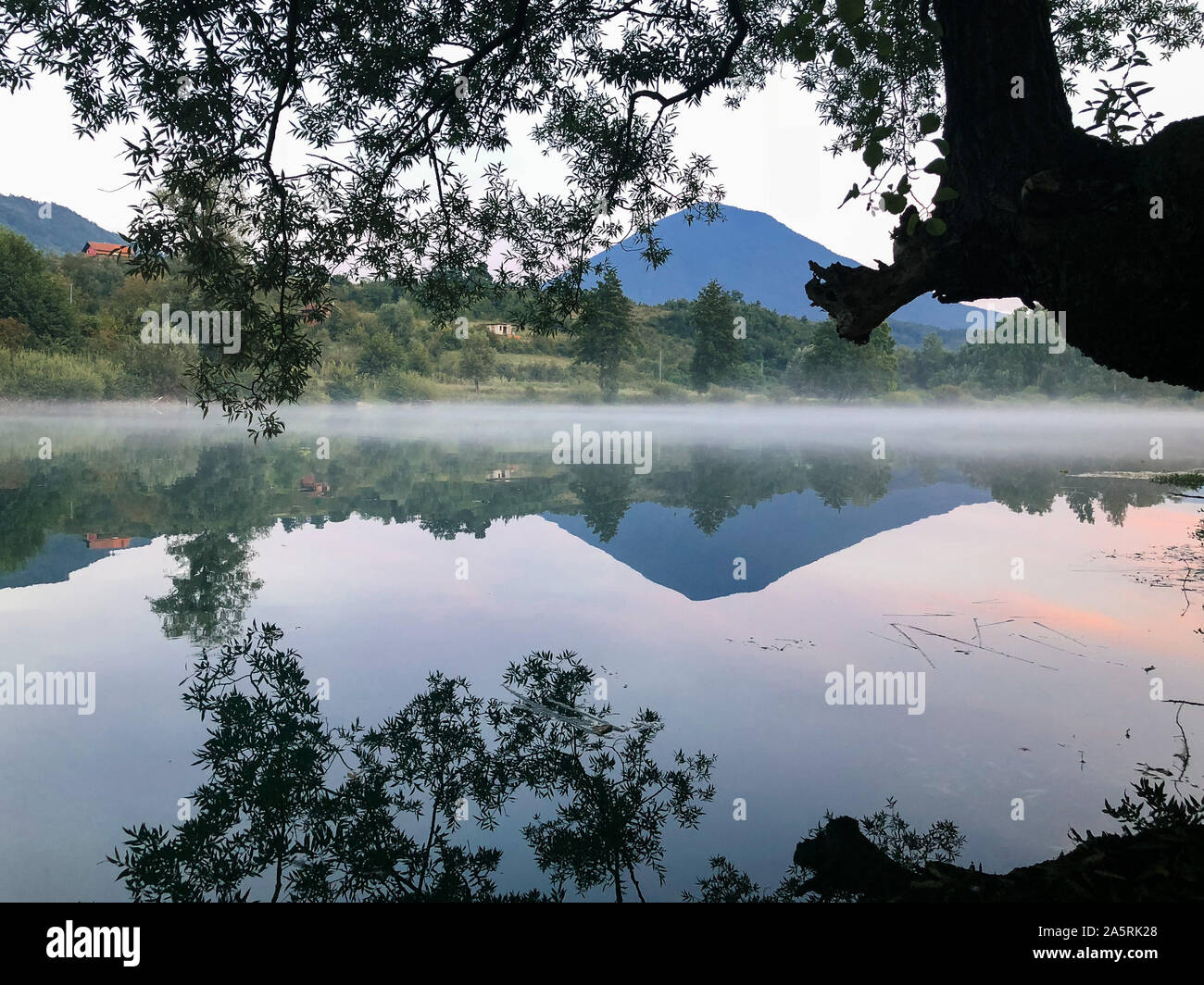 Nature landscape reflection in river Stock Photo - Alamy