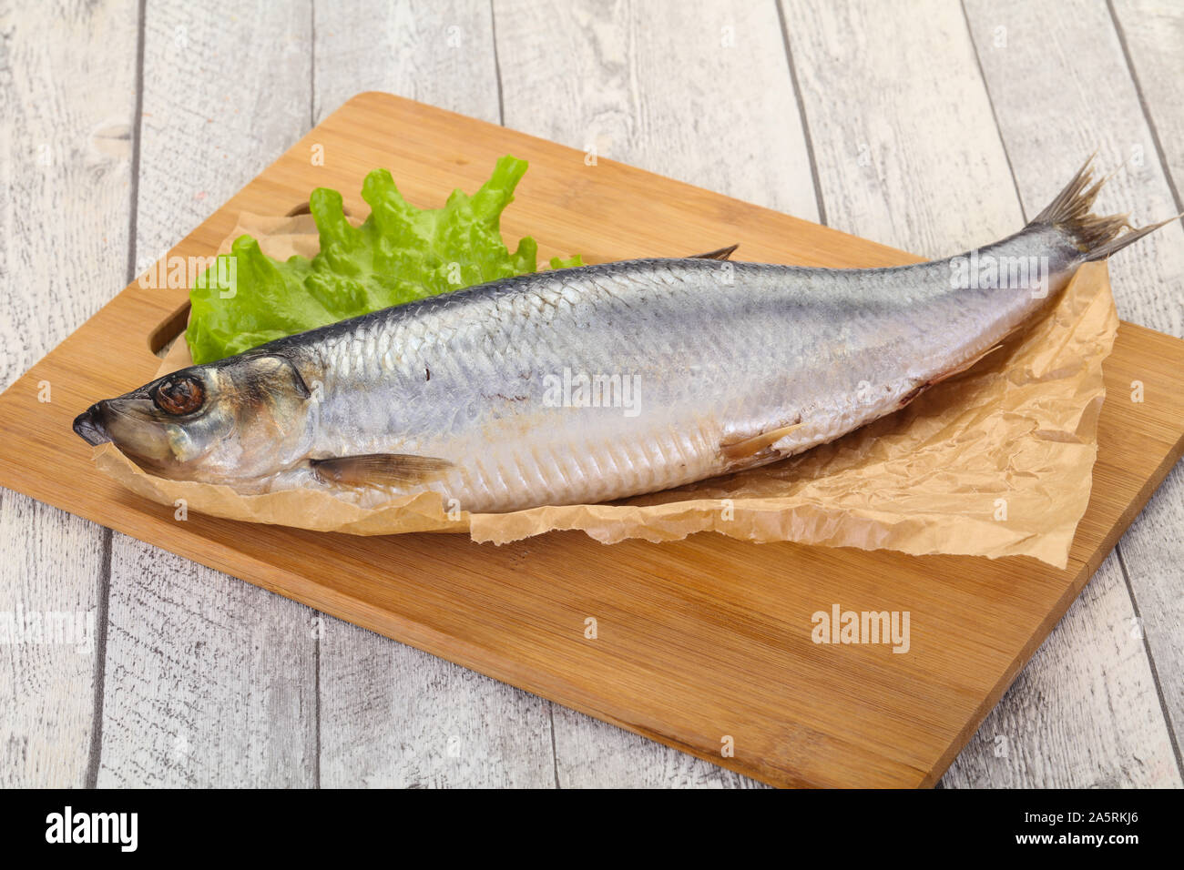 Salted herring fish ready for eat Stock Photo - Alamy