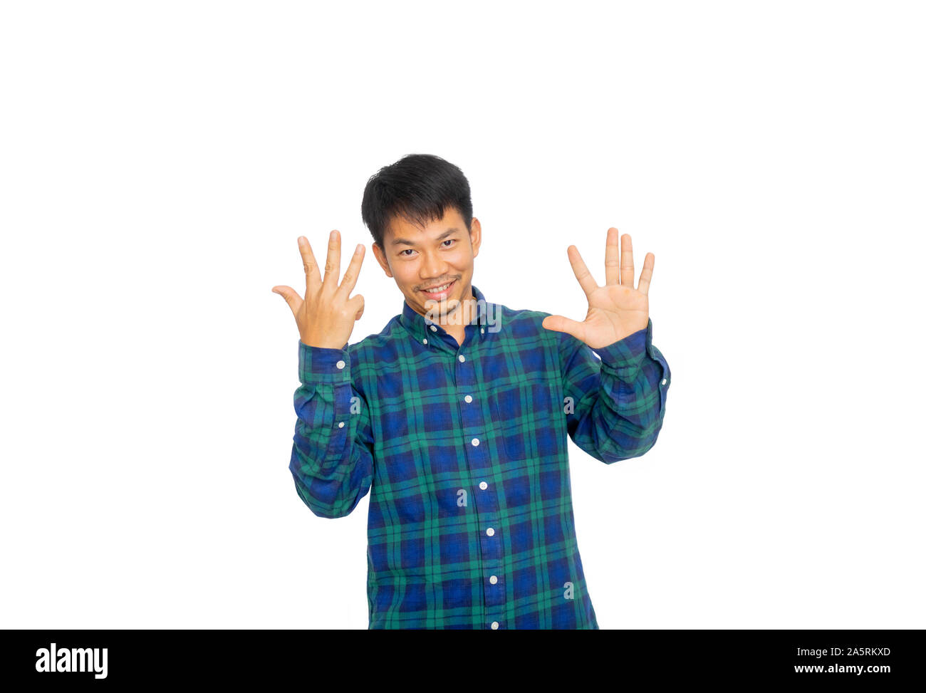 The Asian untidy man in blue plaid shirt is showing number nine symbol ...