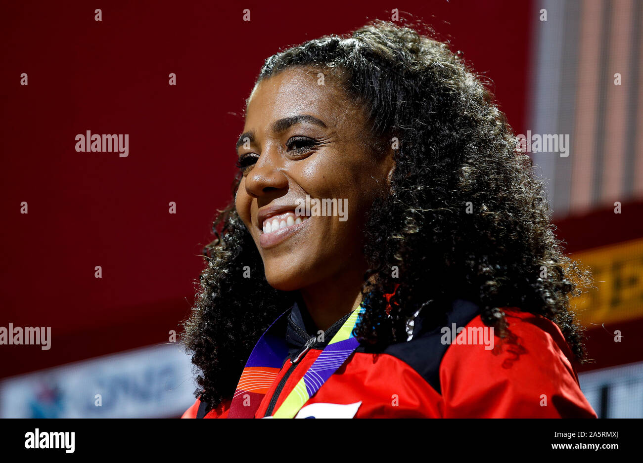 Switzerland's Mujinga Kambundji on the podium after receiving her ...