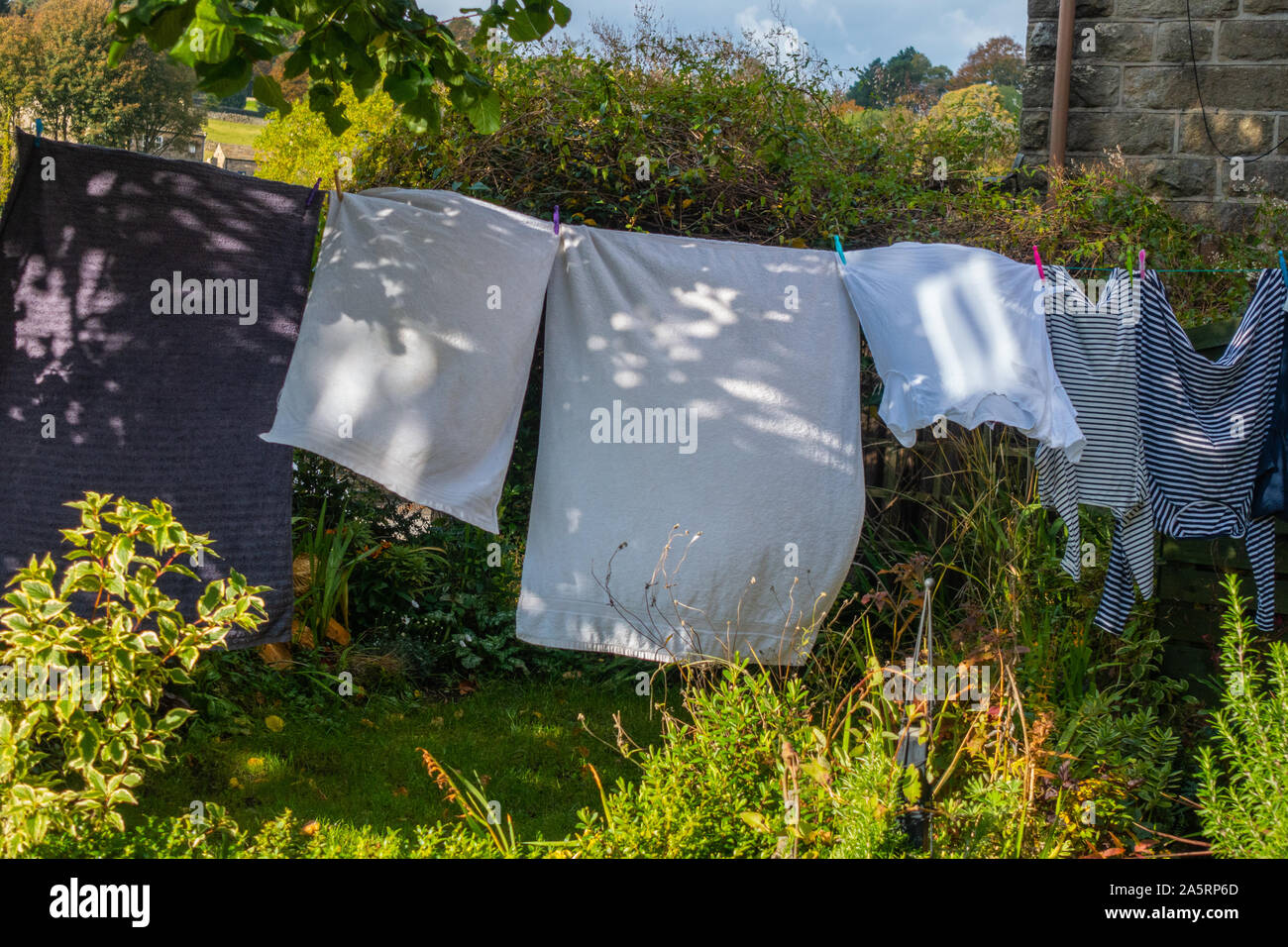 Laundry on a washing line Stock Photo - Alamy