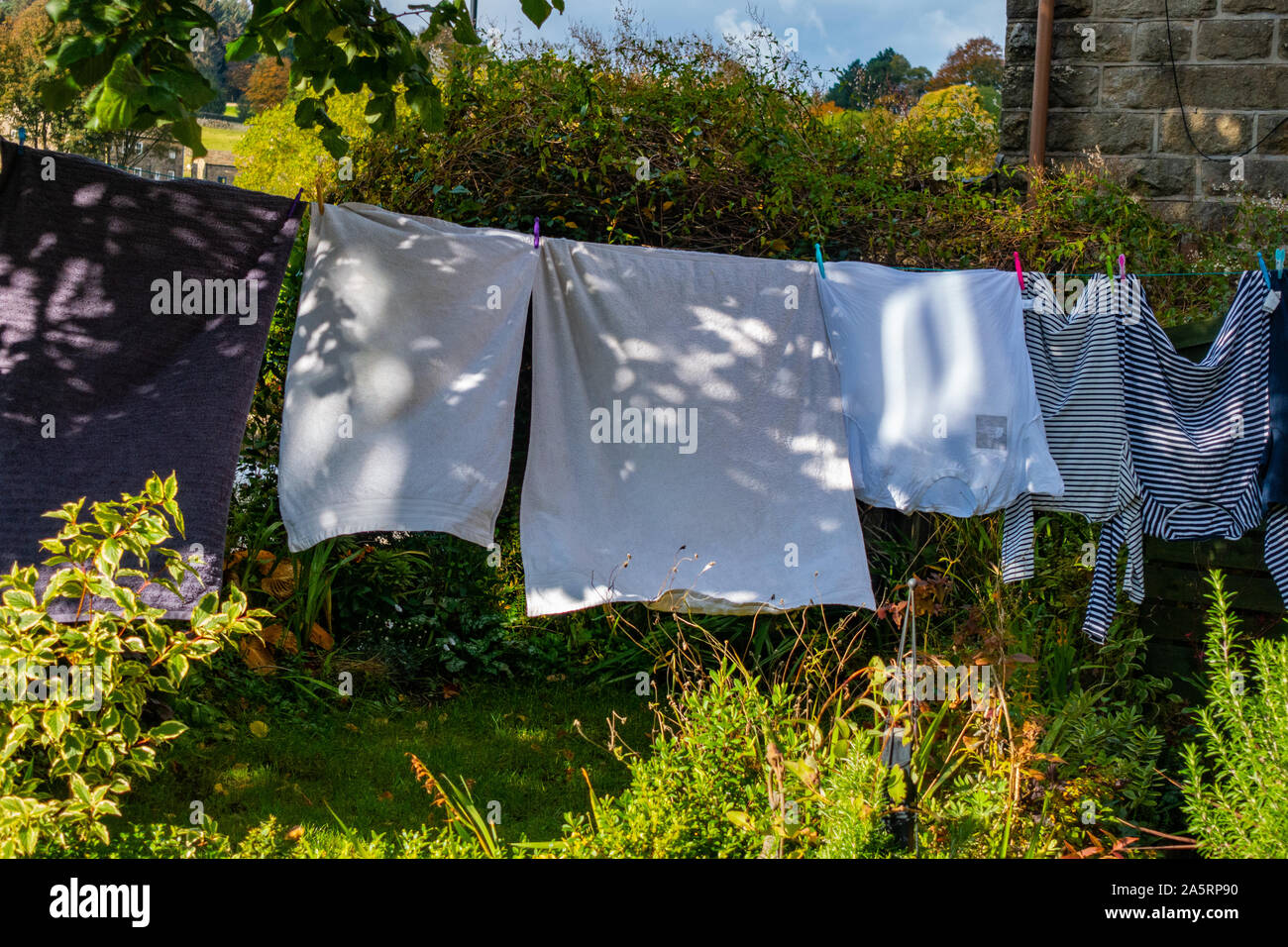 Laundry on a washing line Stock Photo - Alamy