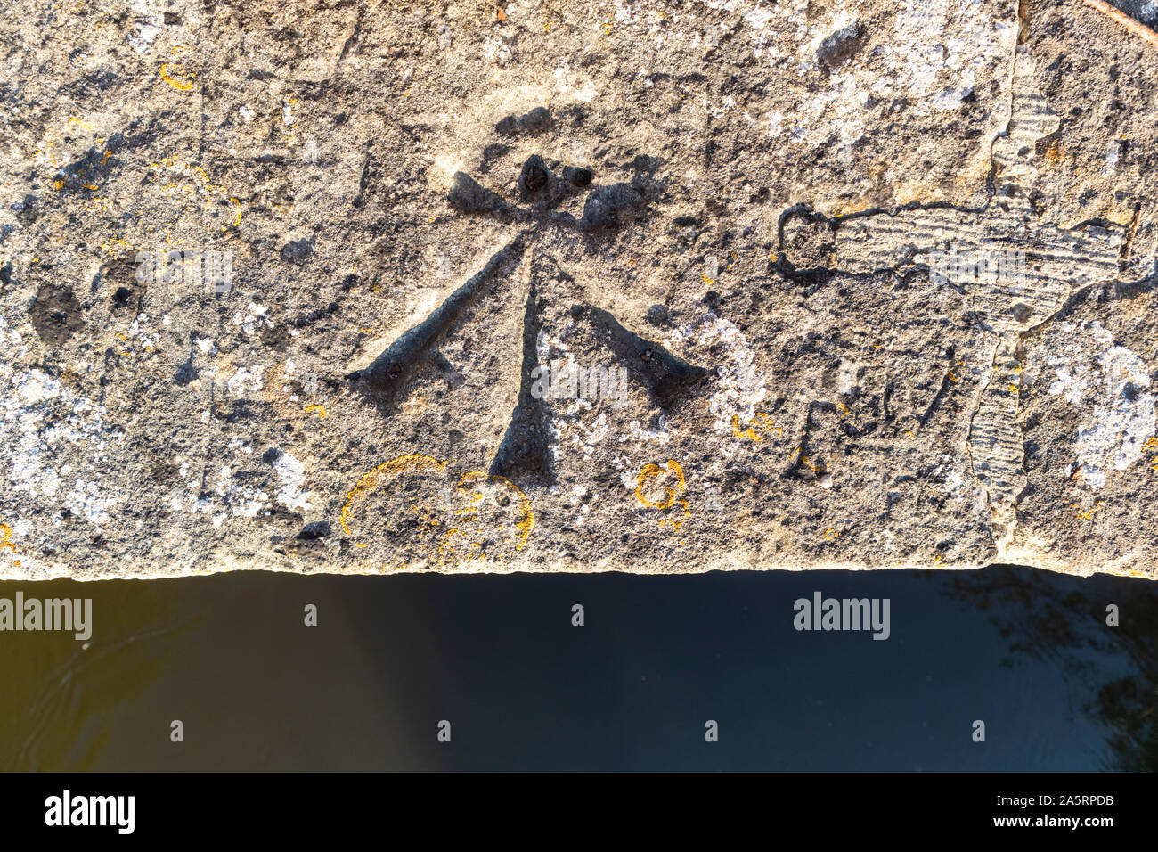 An Ordnance Survey trig point on the parapet of Tadpole Bridge near ...