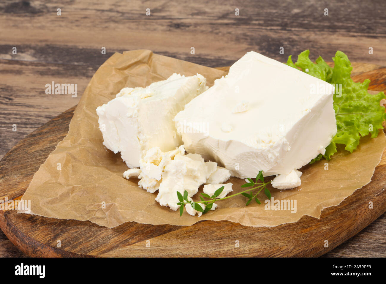 Greek traditional Feta soft cheese in the plate Stock Photo - Alamy