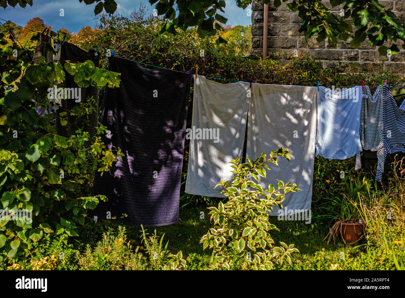 clean washing drying on a line Stock Photo - Alamy