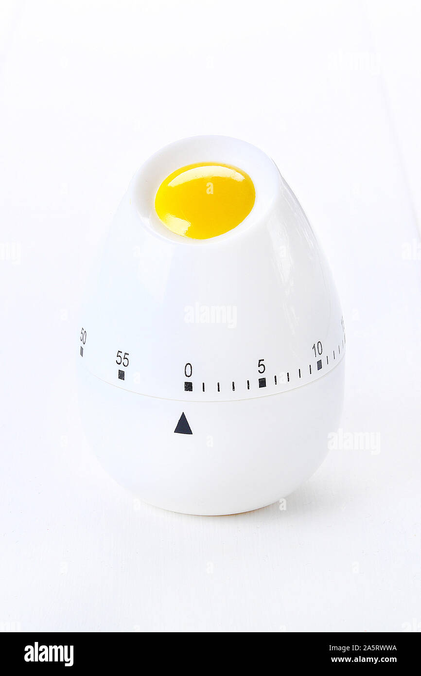 cooking timer kitchen clock alarm on white background. Egg shape Stock ...