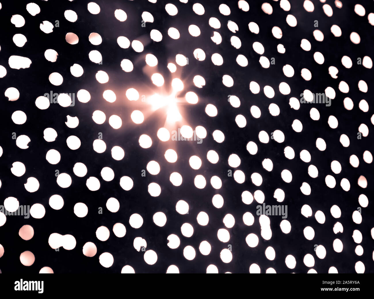 close up texture of sun light and metal dot background , abstract ...
