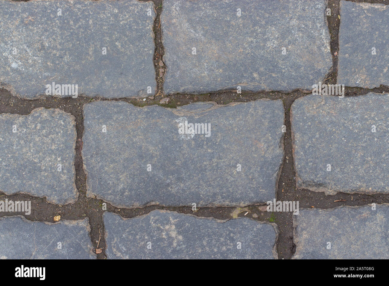 Cobblestone city square, jagged old brick pavement, texture background ...