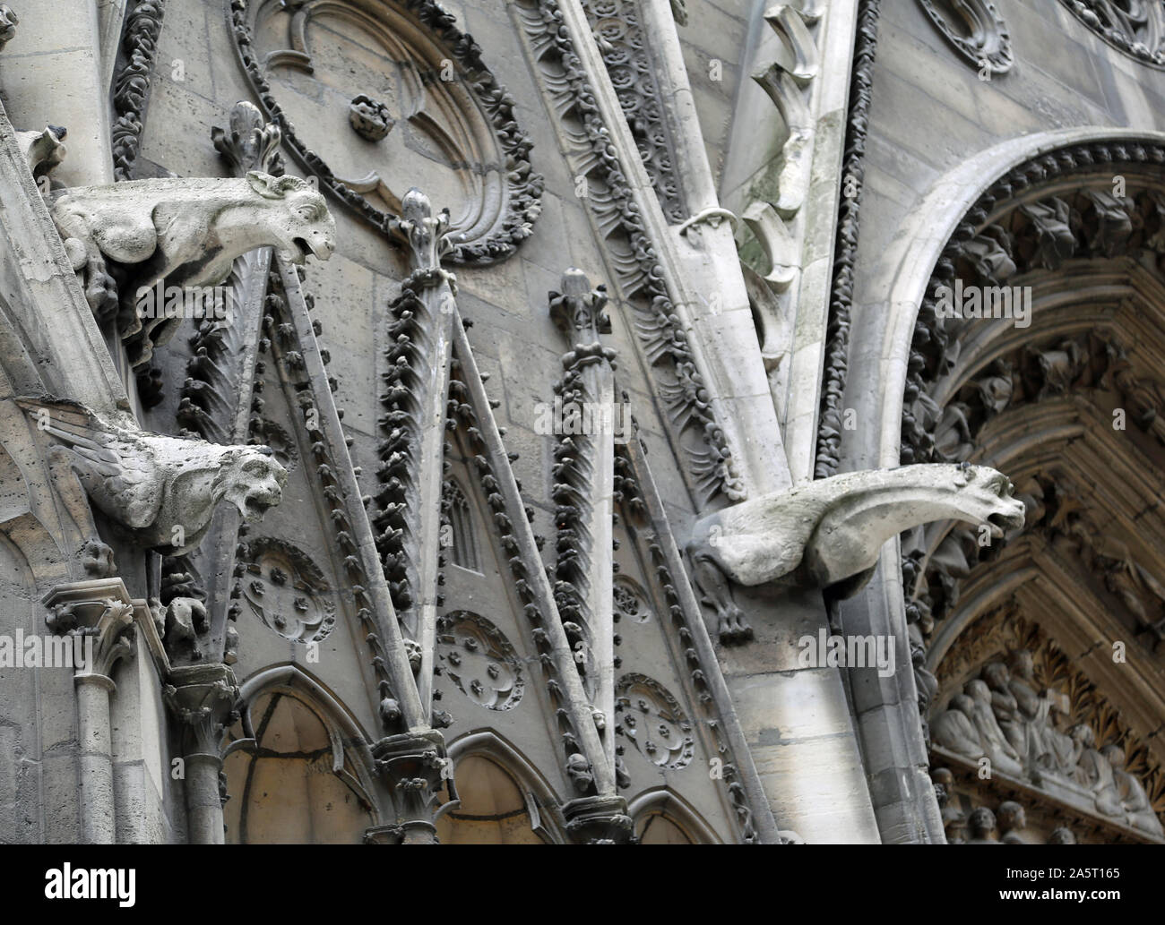 Detail of Cathedral of Notre Dame in Paris France with statue called ...