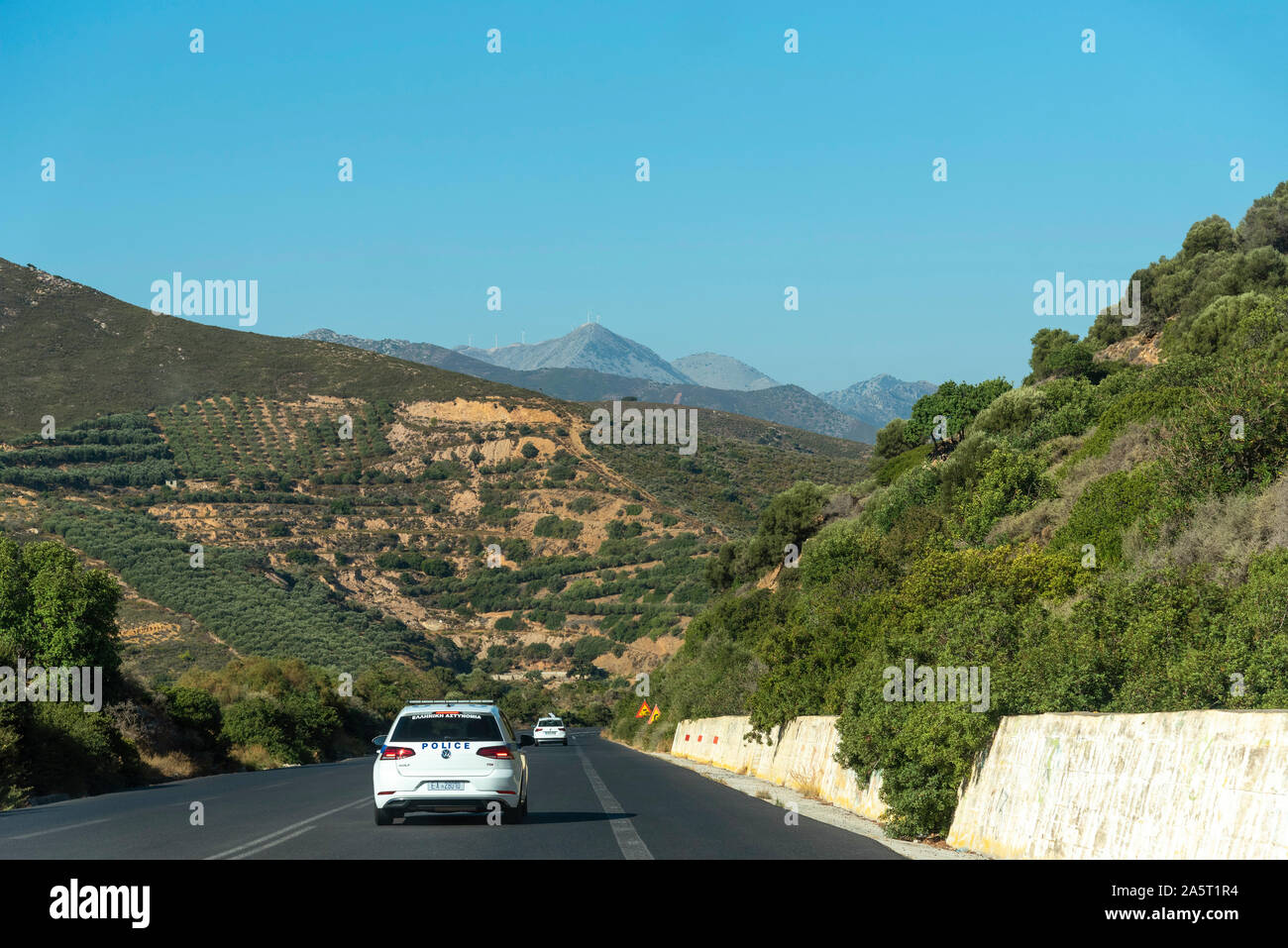 Crete, Greece. October 2019. Following a white police car on the E75 ...