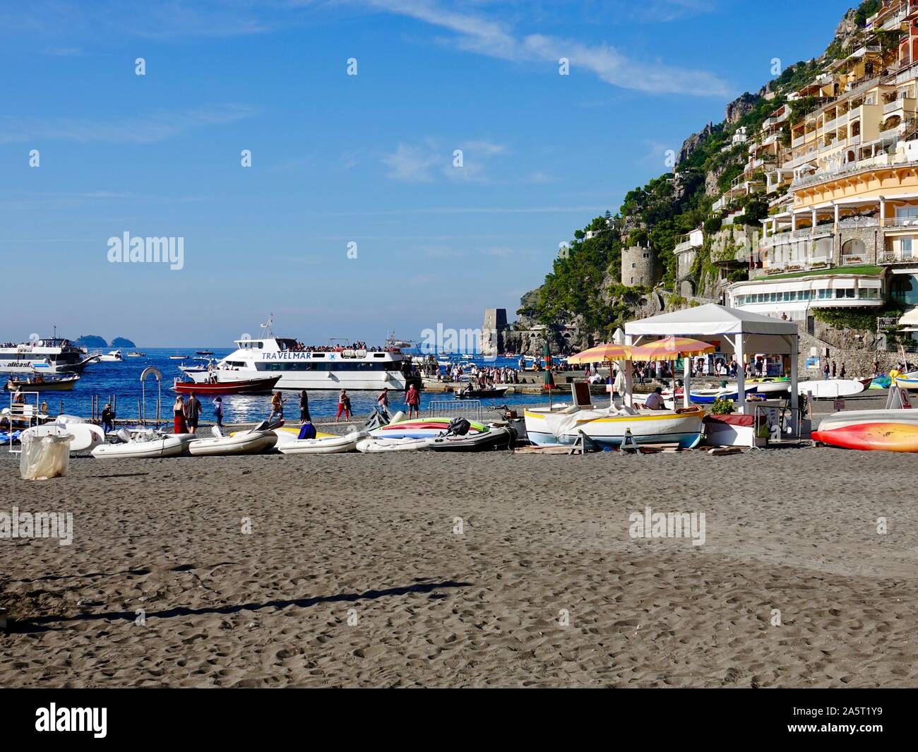 Bustling activity at the Mediterranean Coastal port with boats for rent ...