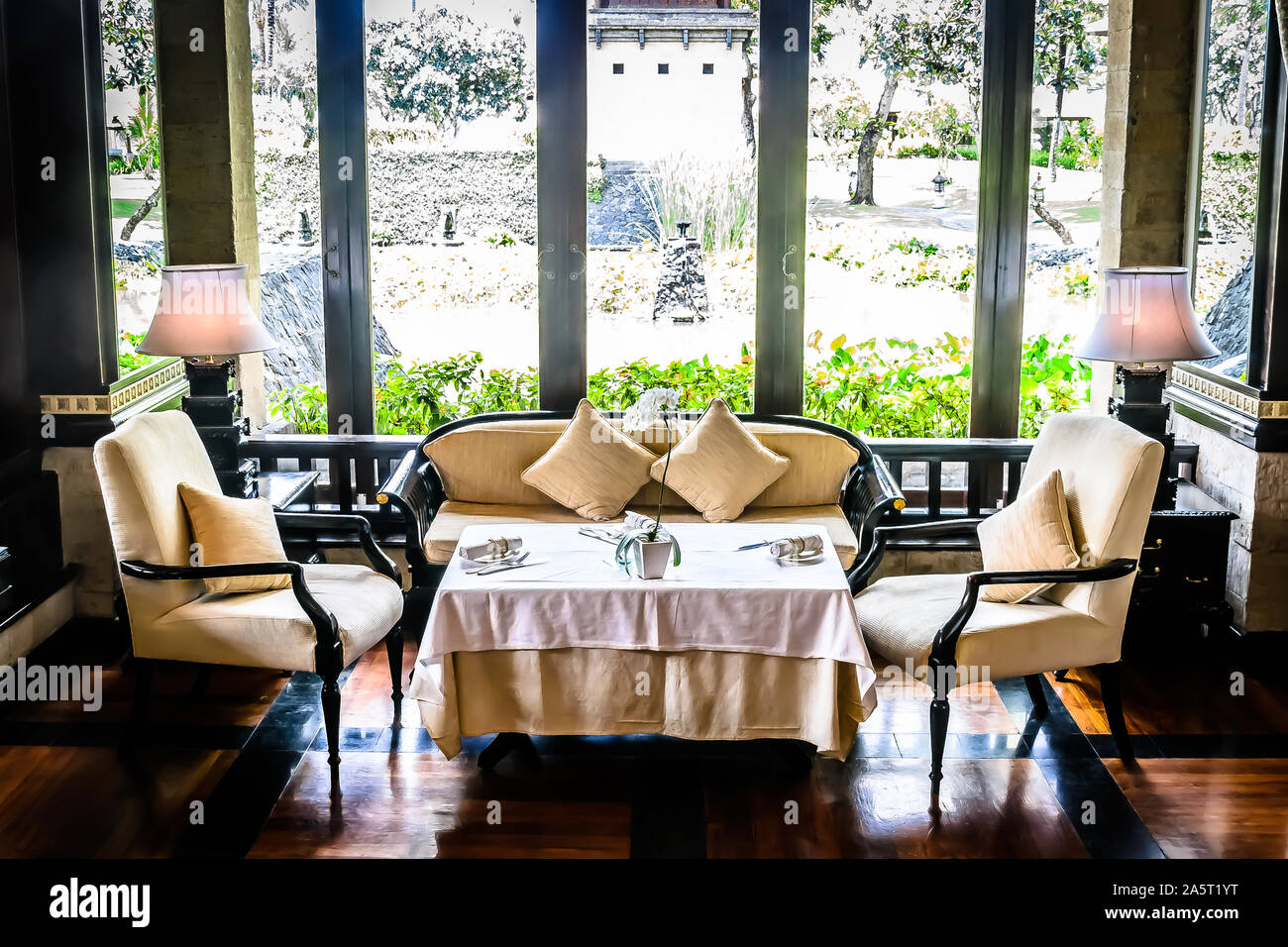 beautiful restaurant with white linen table cloths, white linen napkins ...